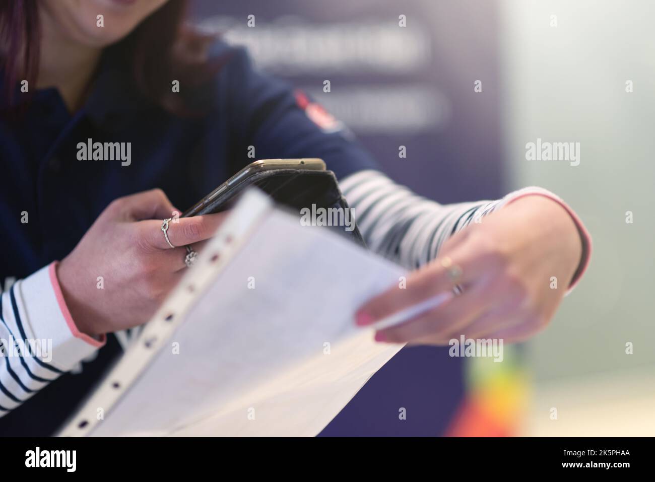 Conference Staff Member scan a QR code from attendee upon arrival to ...