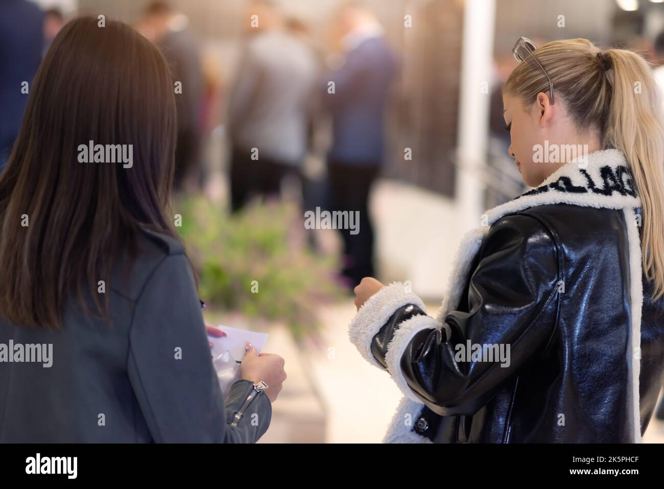 Conference Staff Member scan a QR code from attendee upon arrival to ...