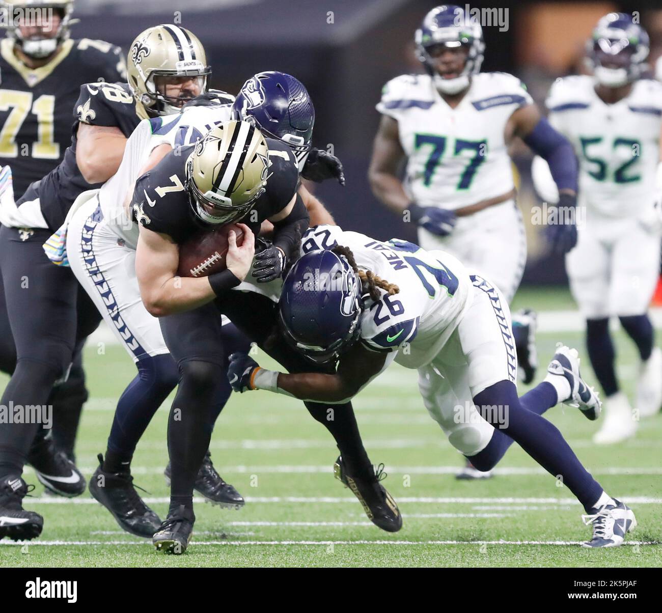 Seattle Seahawks safety Ryan Neal (26) tackles New Orleans Saints ...