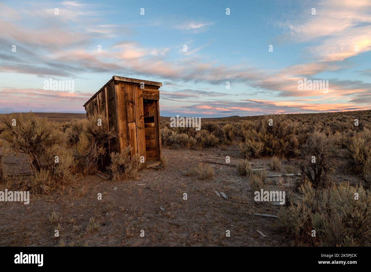 An outhouse sits in the sagebrush at Bitner Ranch in north western ...