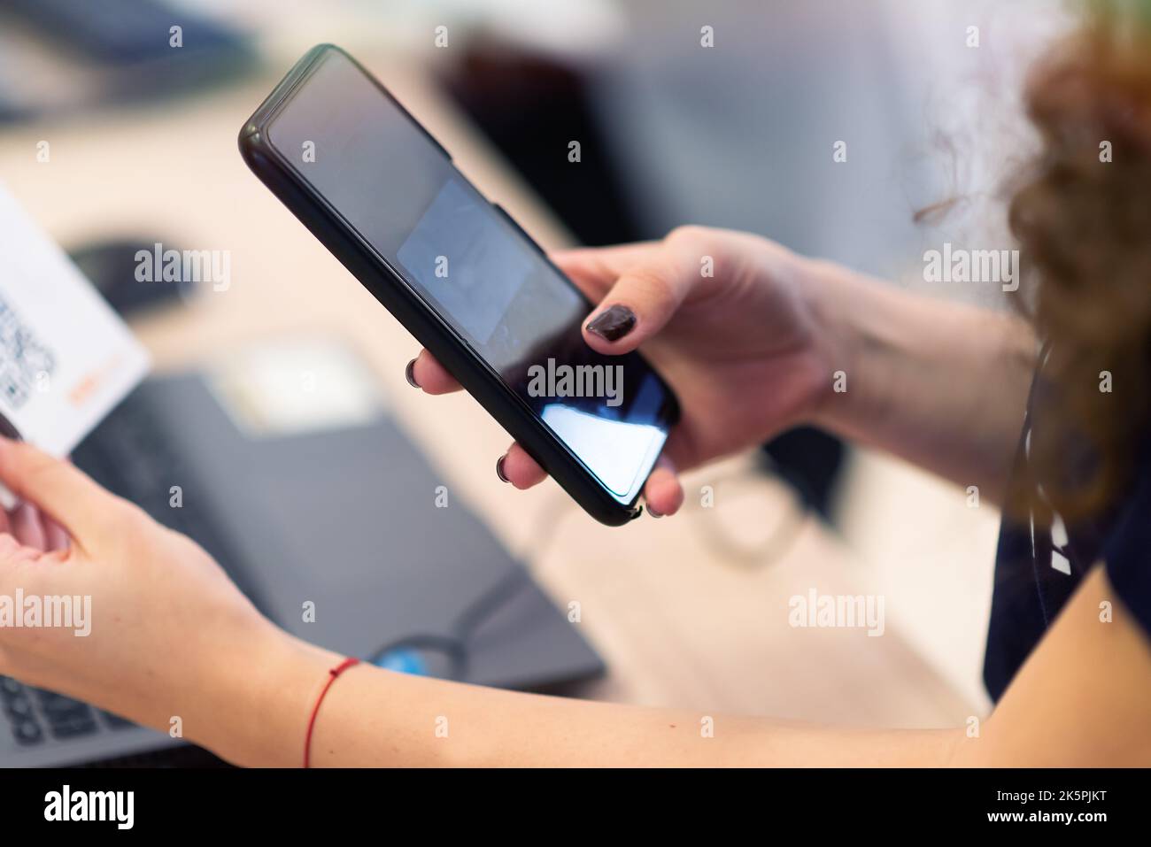 Conference Staff Member scan a QR code from attendee upon arrival to ...