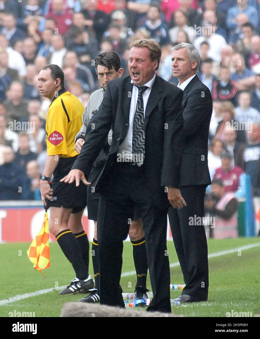 Pompey v West Ham , 14/10/06 The fourth official keeps an eye on Harry ...