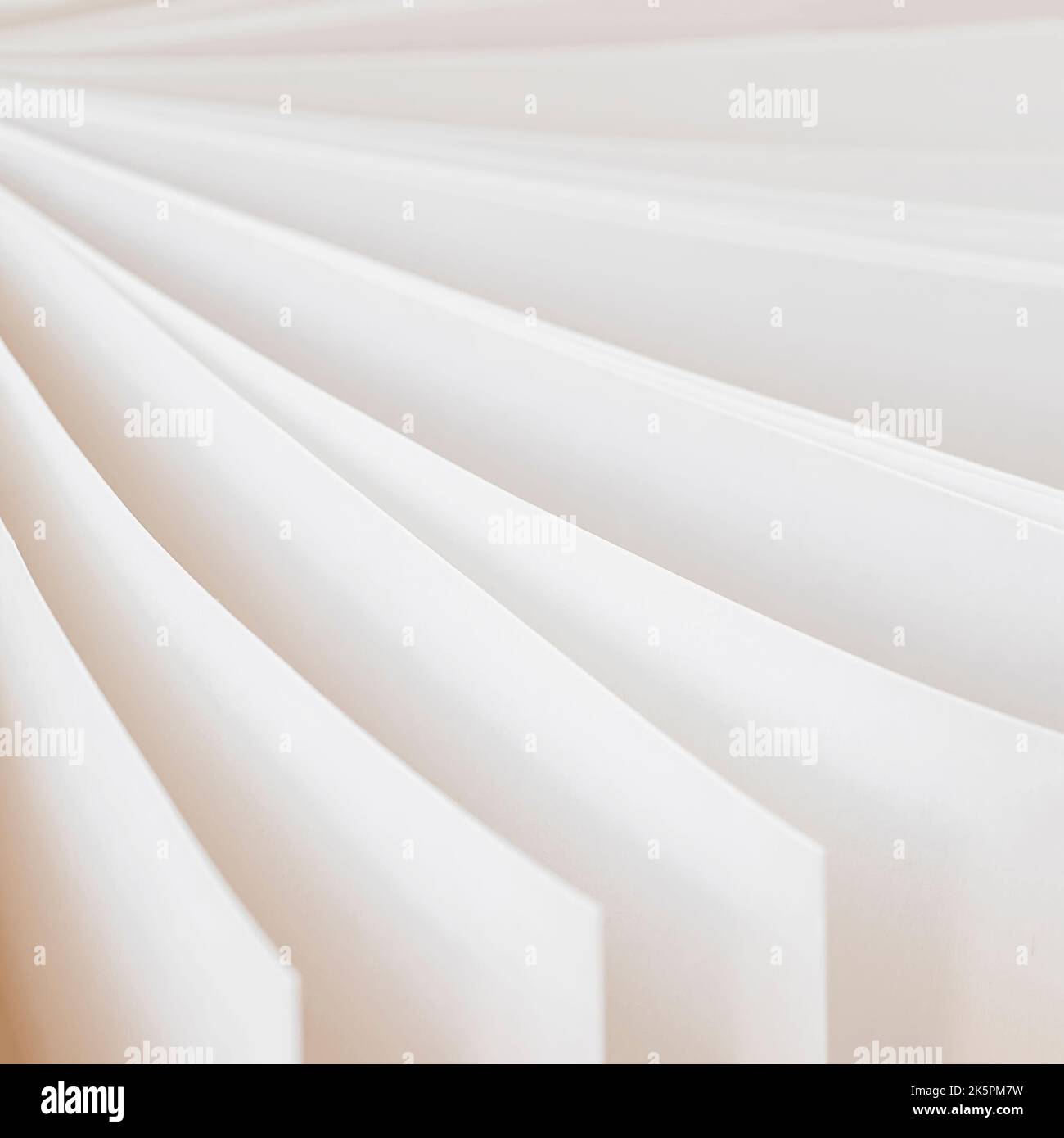Closeup of opened edges of open paper sheets. Book pages, abstract ...