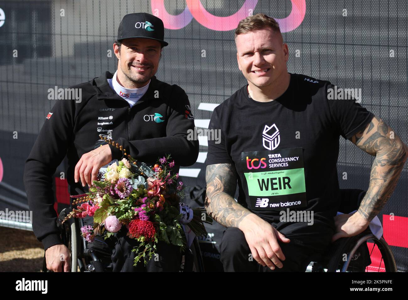 Marcel Hug of Switzerland (winner) and David Weir of Great Britain ...