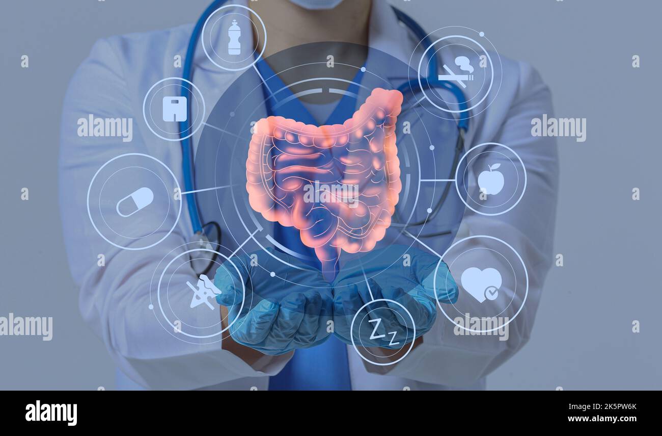 Doctor with bowel and different icons on virtual screen against color ...