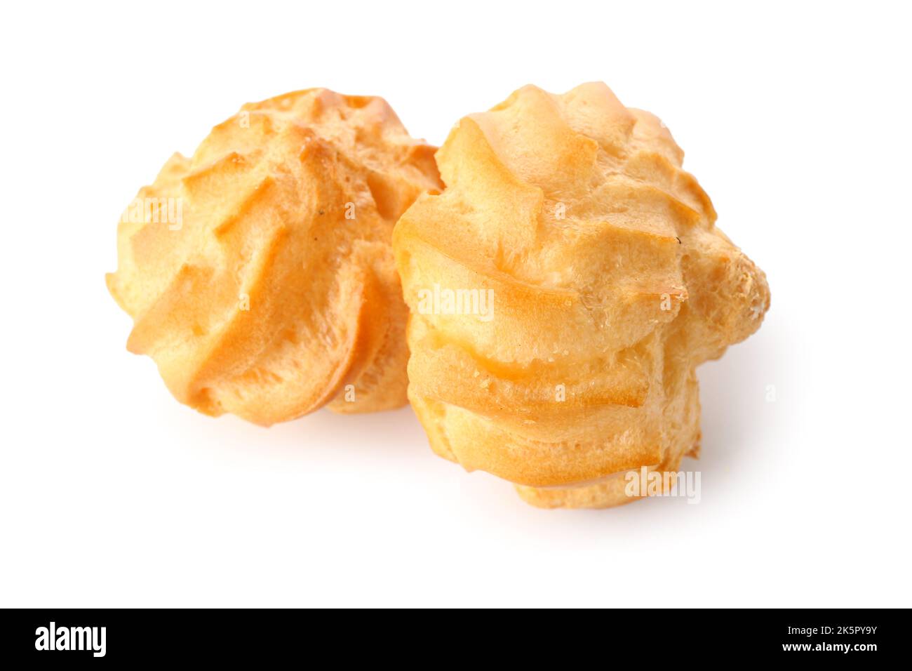 Tasty round eclairs on white background Stock Photo - Alamy