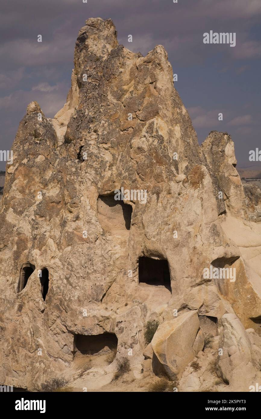 Rock-cut cave dwellings in the Goreme valley, Cappadocia region, Turkey ...