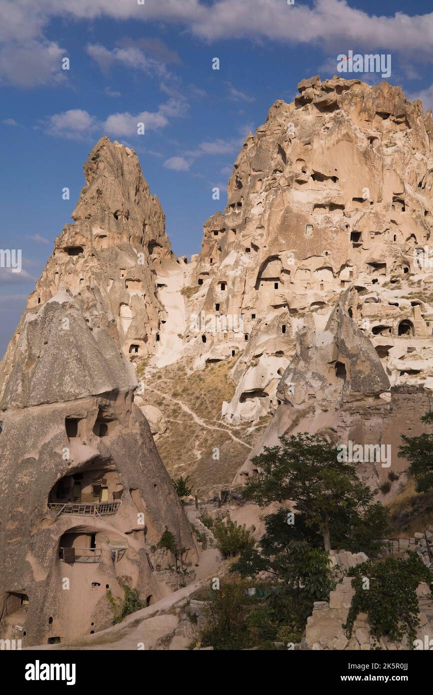 Rock-cut cave dwellings in Uchisar village, Cappadocia region, Turkey ...