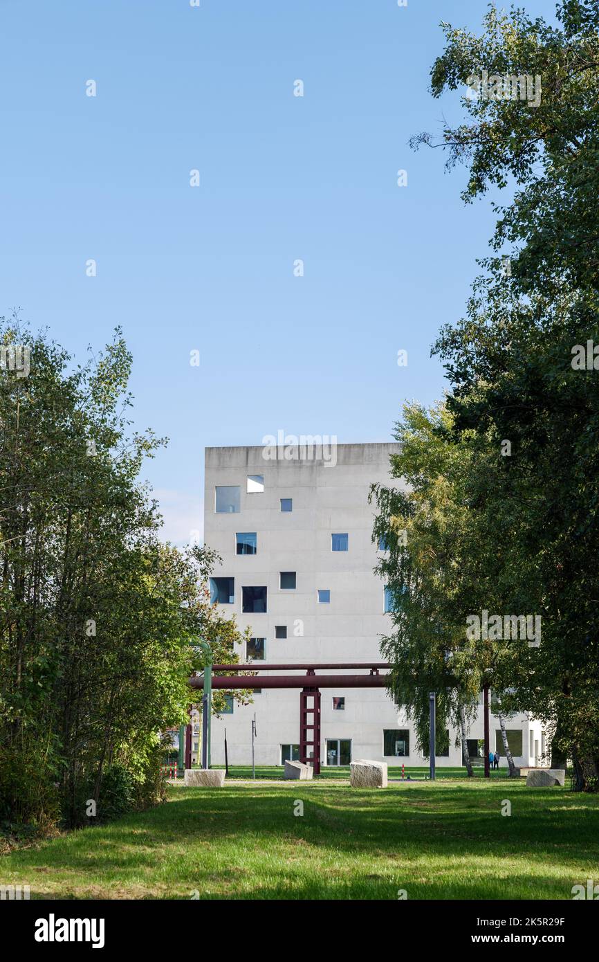 Iconic modern architecture with concrete facade, random pattern and ...