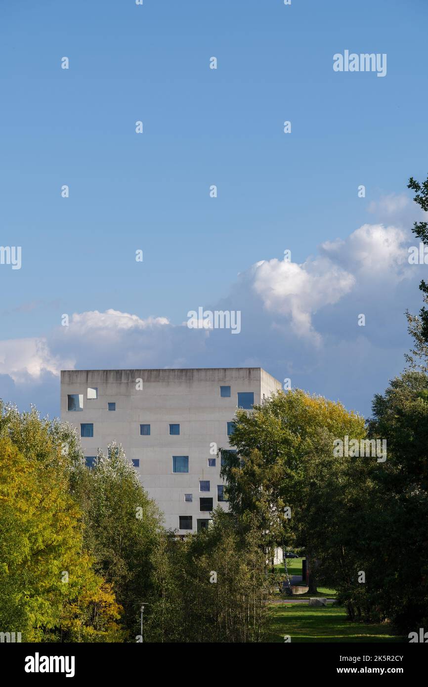 Iconic modern architecture with concrete facade, random pattern and ...