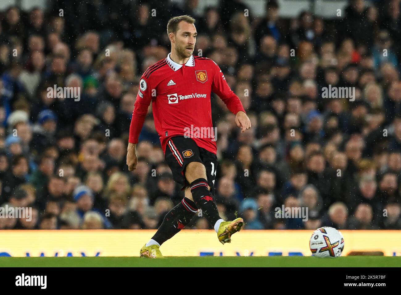 Christian Eriksen #14 of Manchester United passes the ball during the Premier League match ...