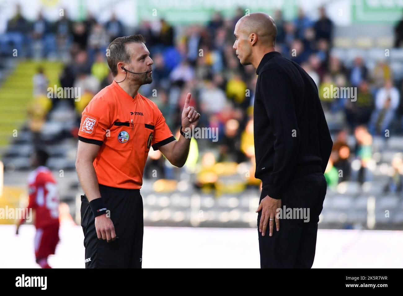 referee Ken Vermeiren and SL16's coach Joseph Laumann pictured during a ...