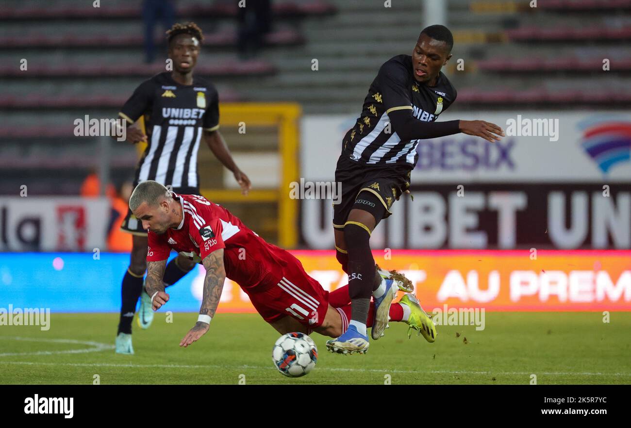 Standard's Aron Donnum and Charleroi's Ken Nkuba Tshiend fight for the ...