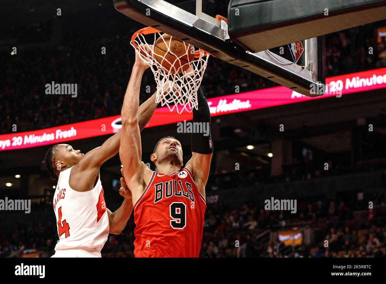 Chicago Bulls centre Nikola Vucevic (9) dunks the ball, despite the ...