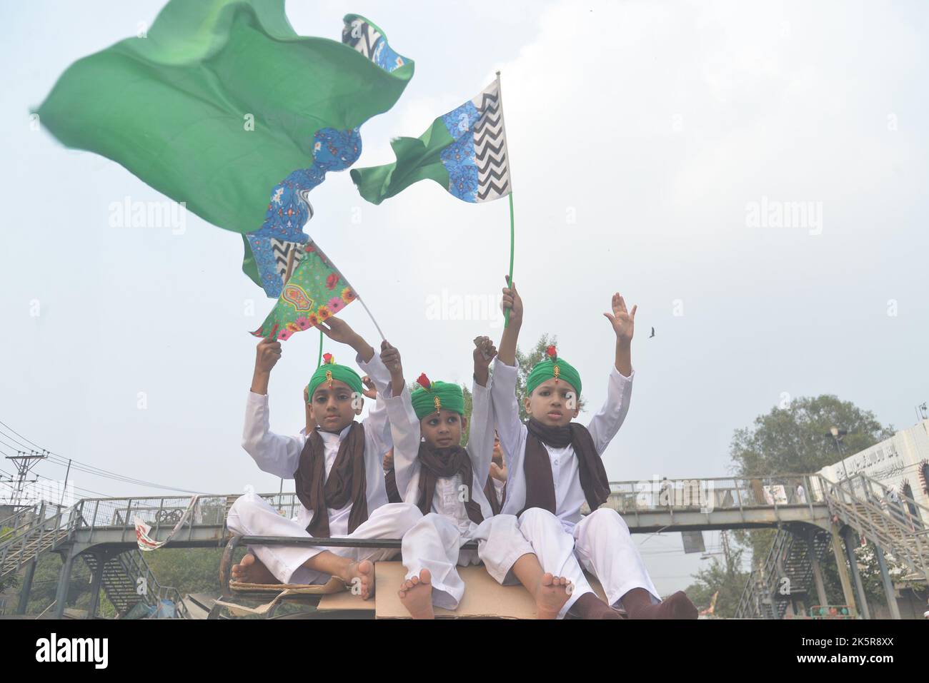 Pakistani faithful devotees participate in a procession of Eid Milad-un ...