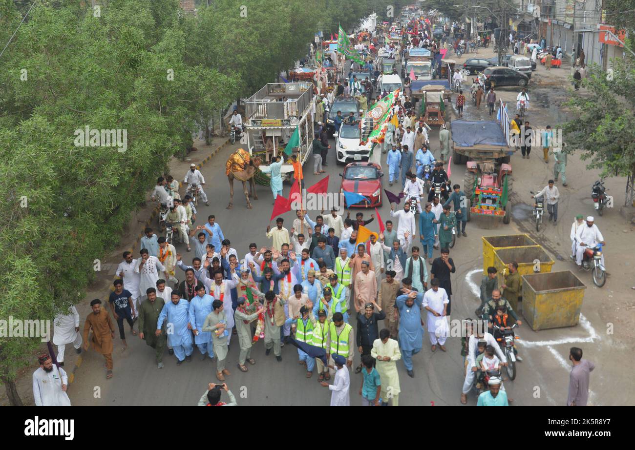 Pakistani faithful devotees participate in a procession of Eid Milad-un ...