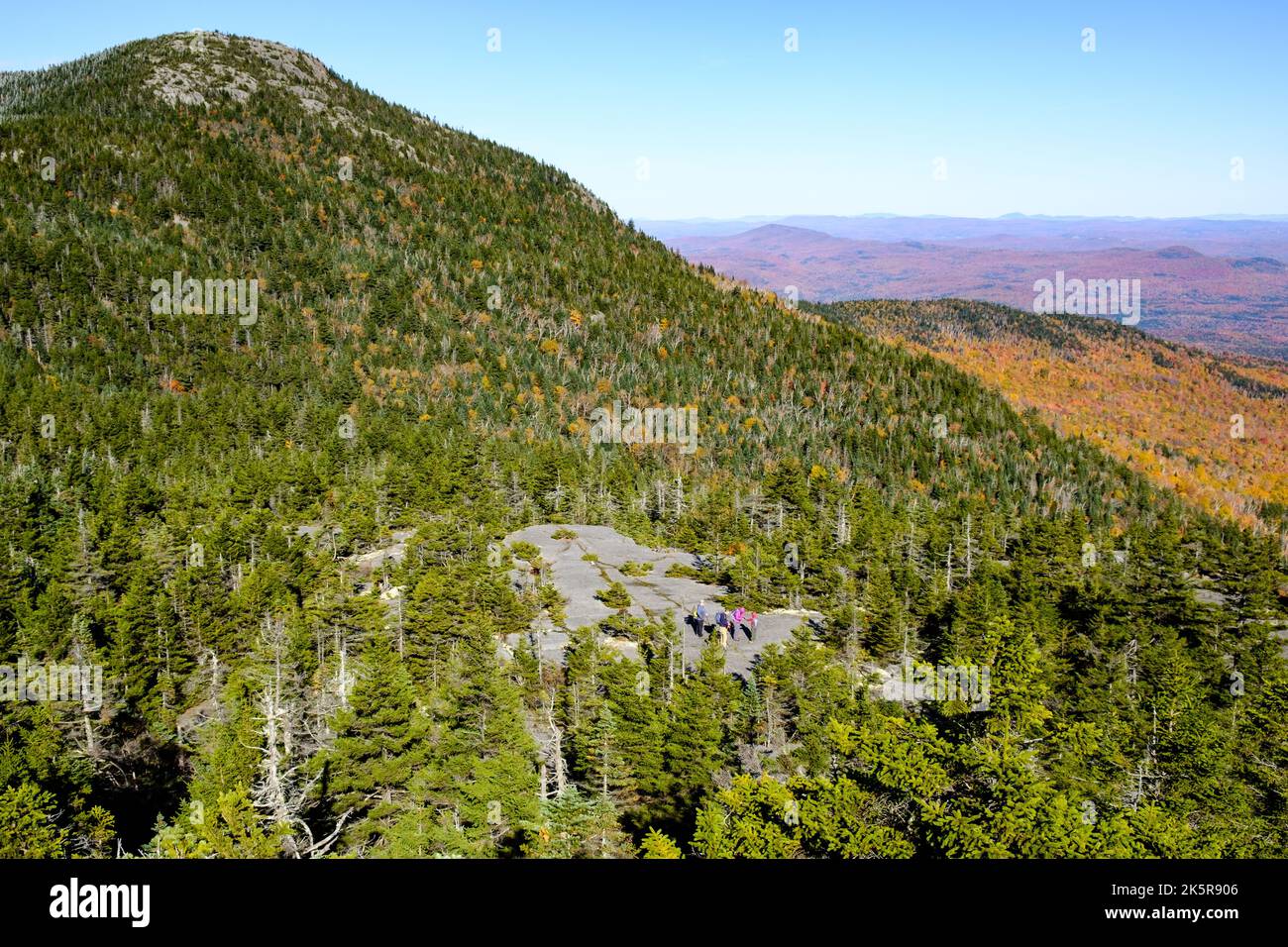 The vibrant colors of autumn foliage surround Mountain Hunger as seen ...