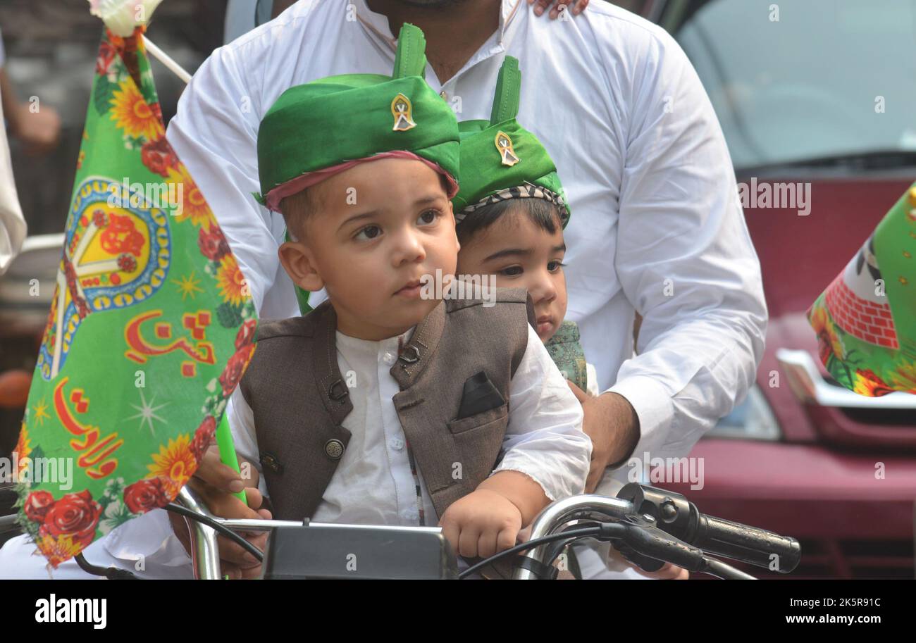 Pakistani faithful devotees participate in a procession of Eid Milad-un ...