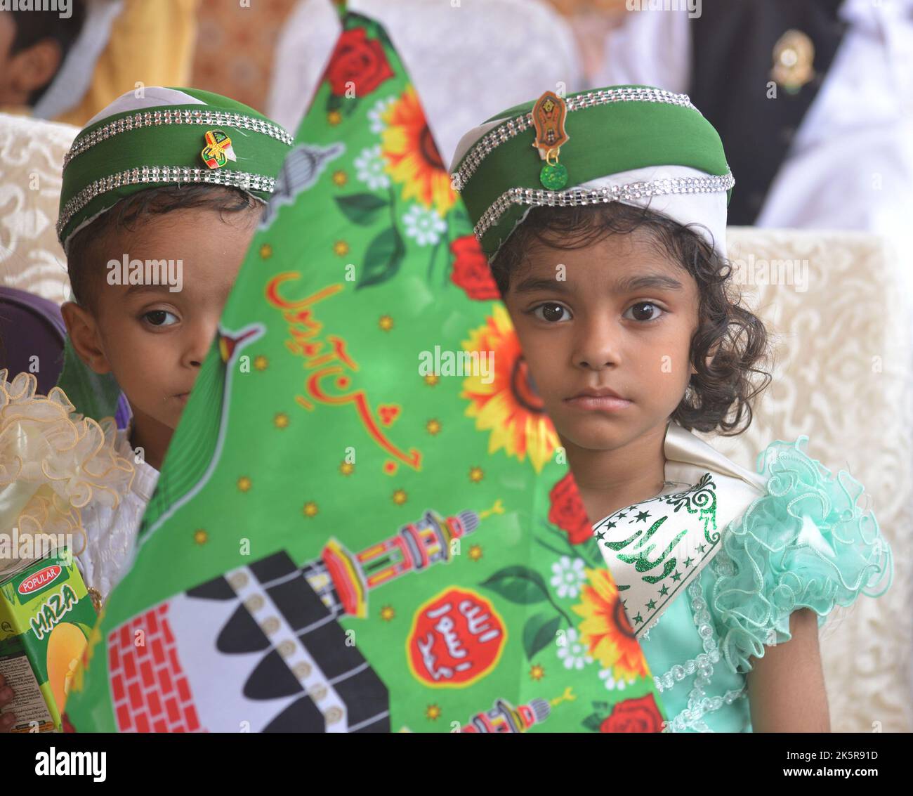Pakistani faithful devotees participate in a procession of Eid Milad-un ...