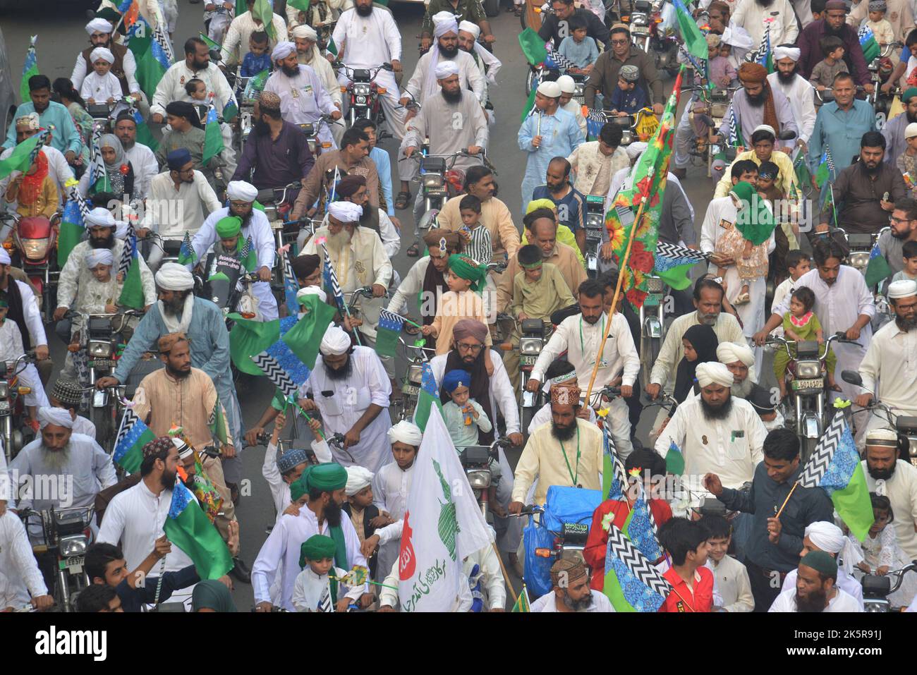 Pakistani faithful devotees participate in a procession of Eid Milad-un ...
