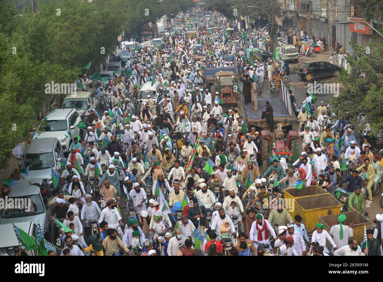 Pakistani faithful devotees participate in a procession of Eid Milad-un ...