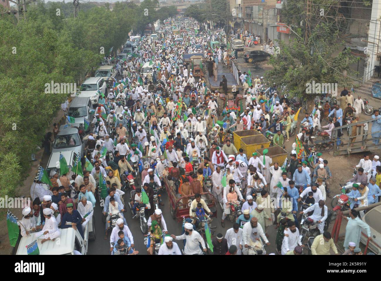 Pakistani faithful devotees participate in a procession of Eid Milad-un ...