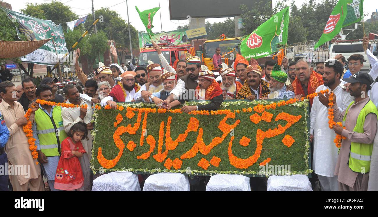 Pakistani faithful devotees participate in a procession of Eid Milad-un ...