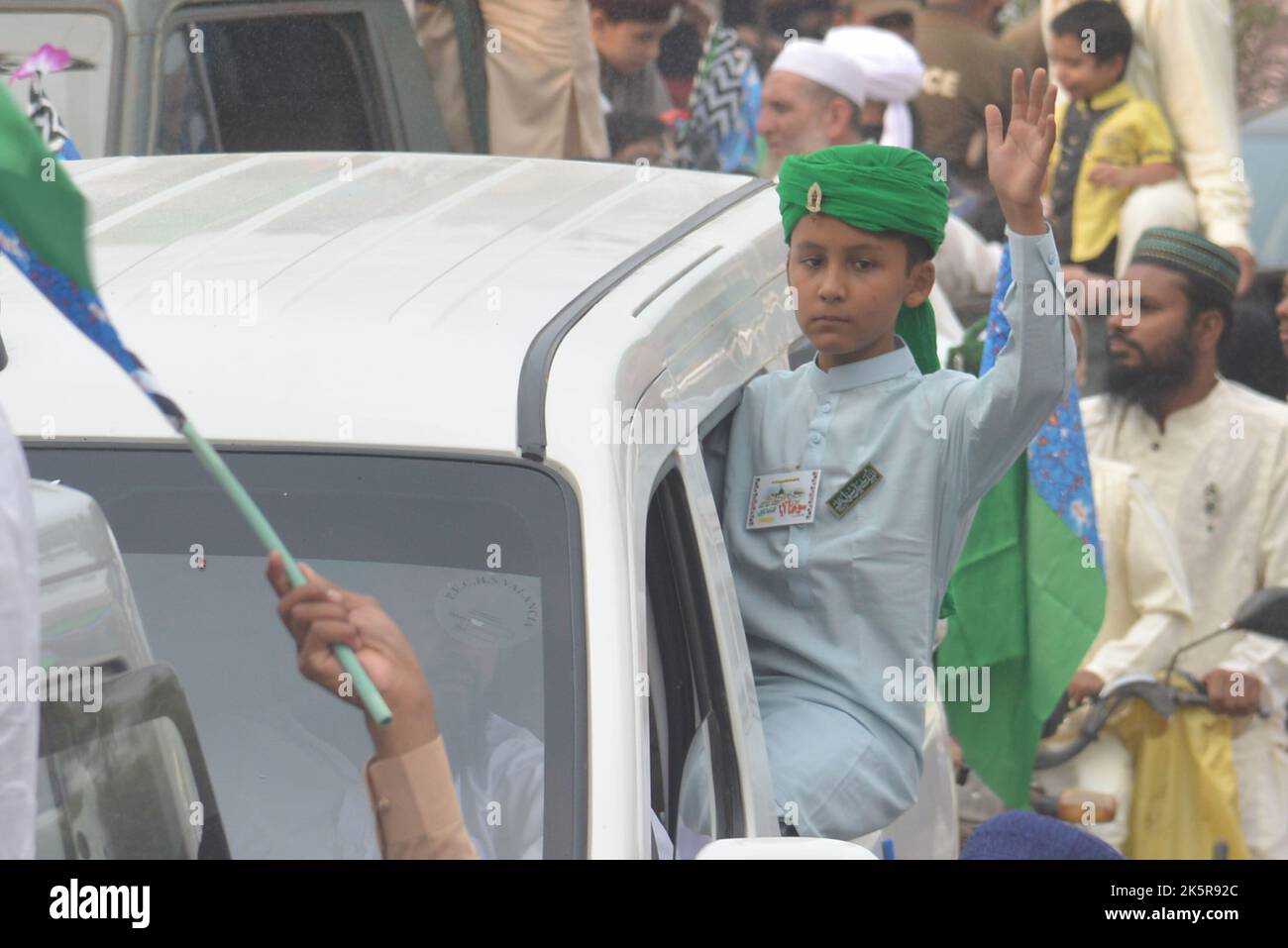 Pakistani faithful devotees participate in a procession of Eid Milad-un ...