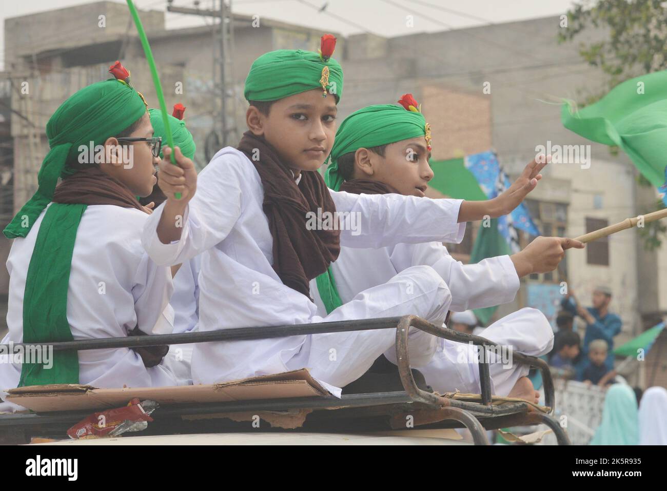 Pakistani faithful devotees participate in a procession of Eid Milad-un ...