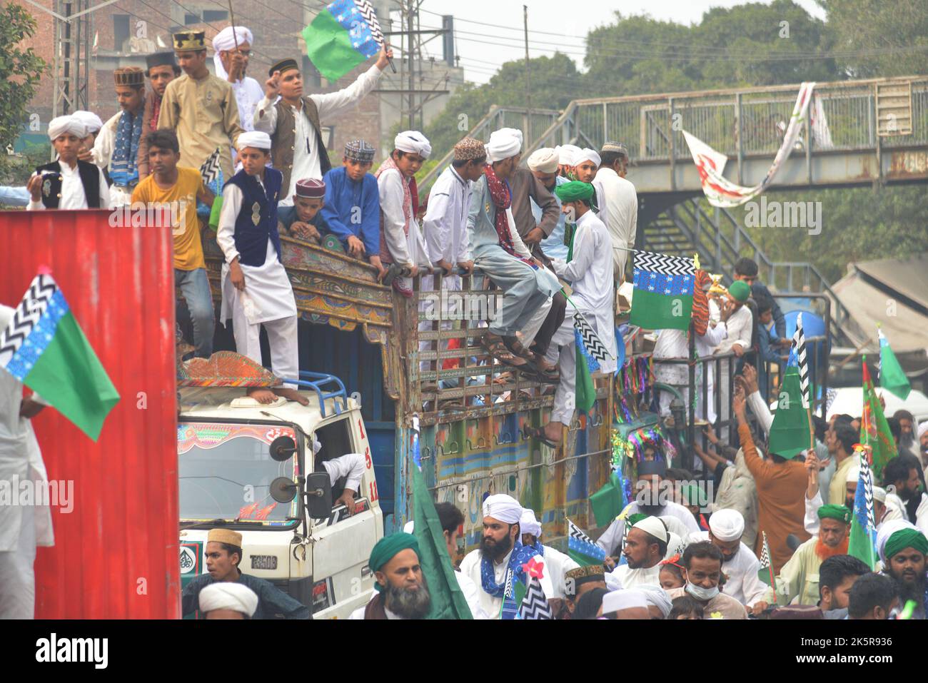 Pakistani faithful devotees participate in a procession of Eid Milad-un ...