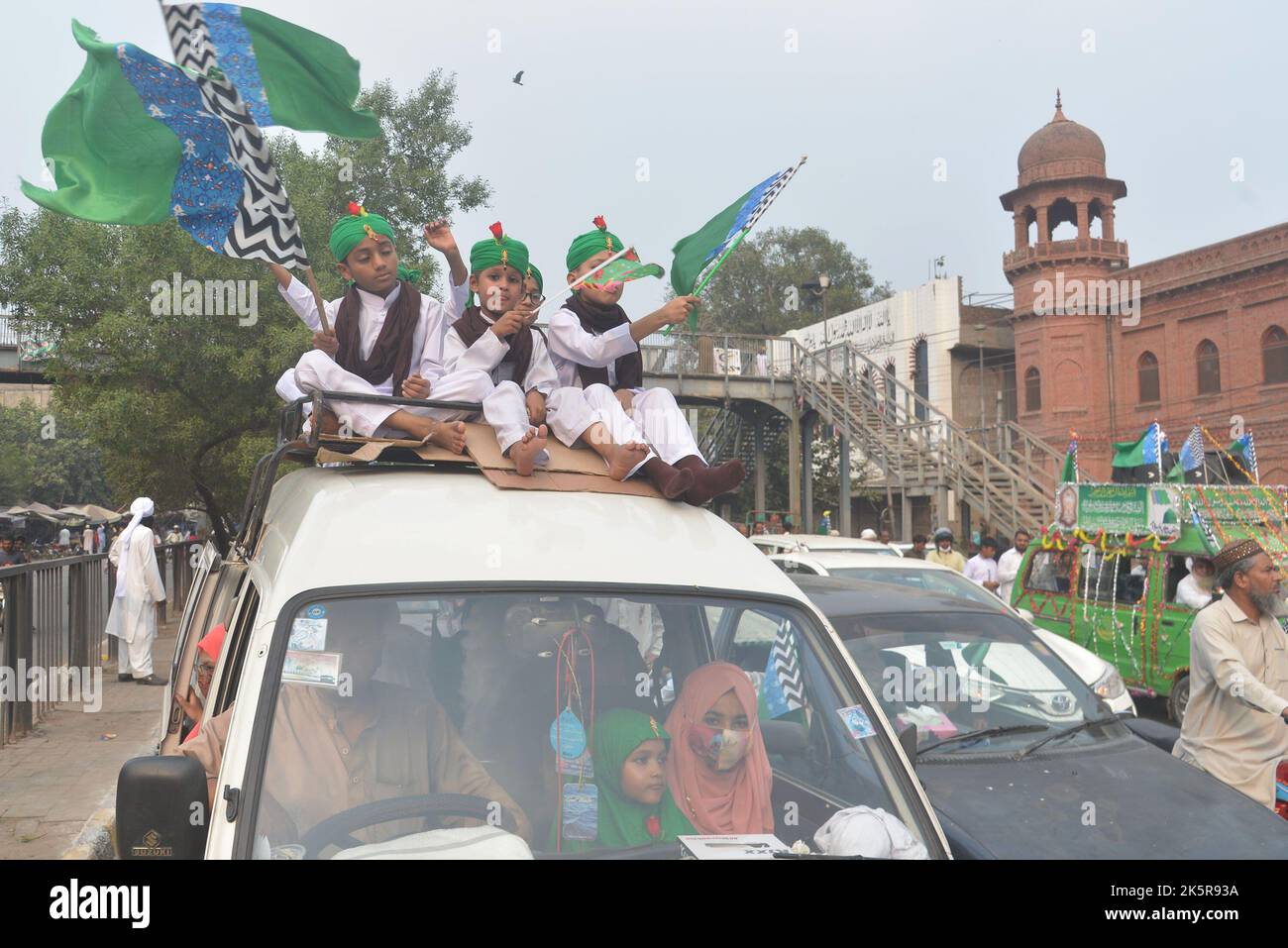Pakistani faithful devotees participate in a procession of Eid Milad-un ...