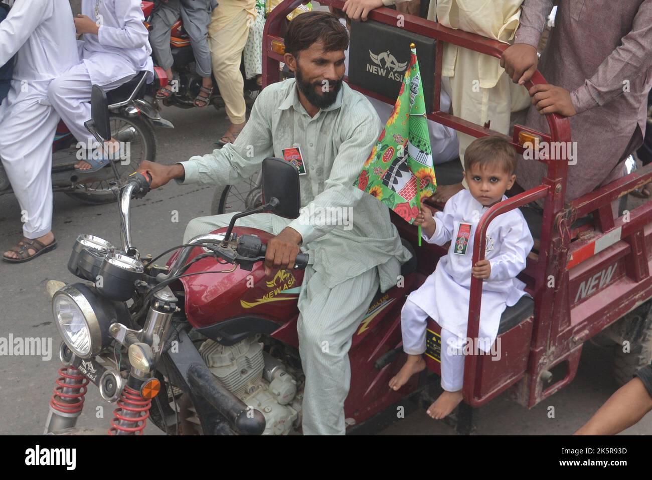 Pakistani faithful devotees participate in a procession of Eid Milad-un ...