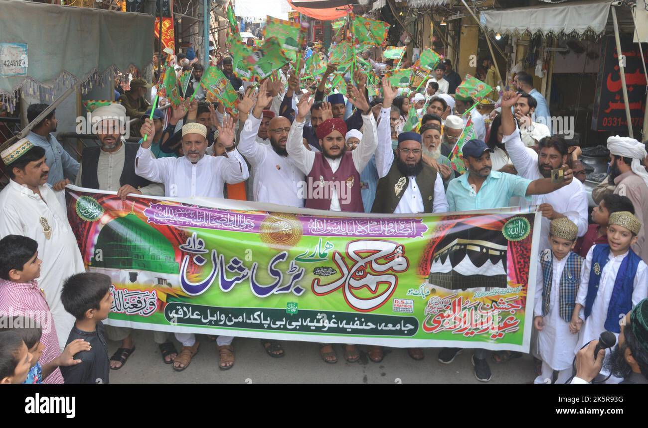 Pakistani faithful devotees participate in a procession of Eid Milad-un ...