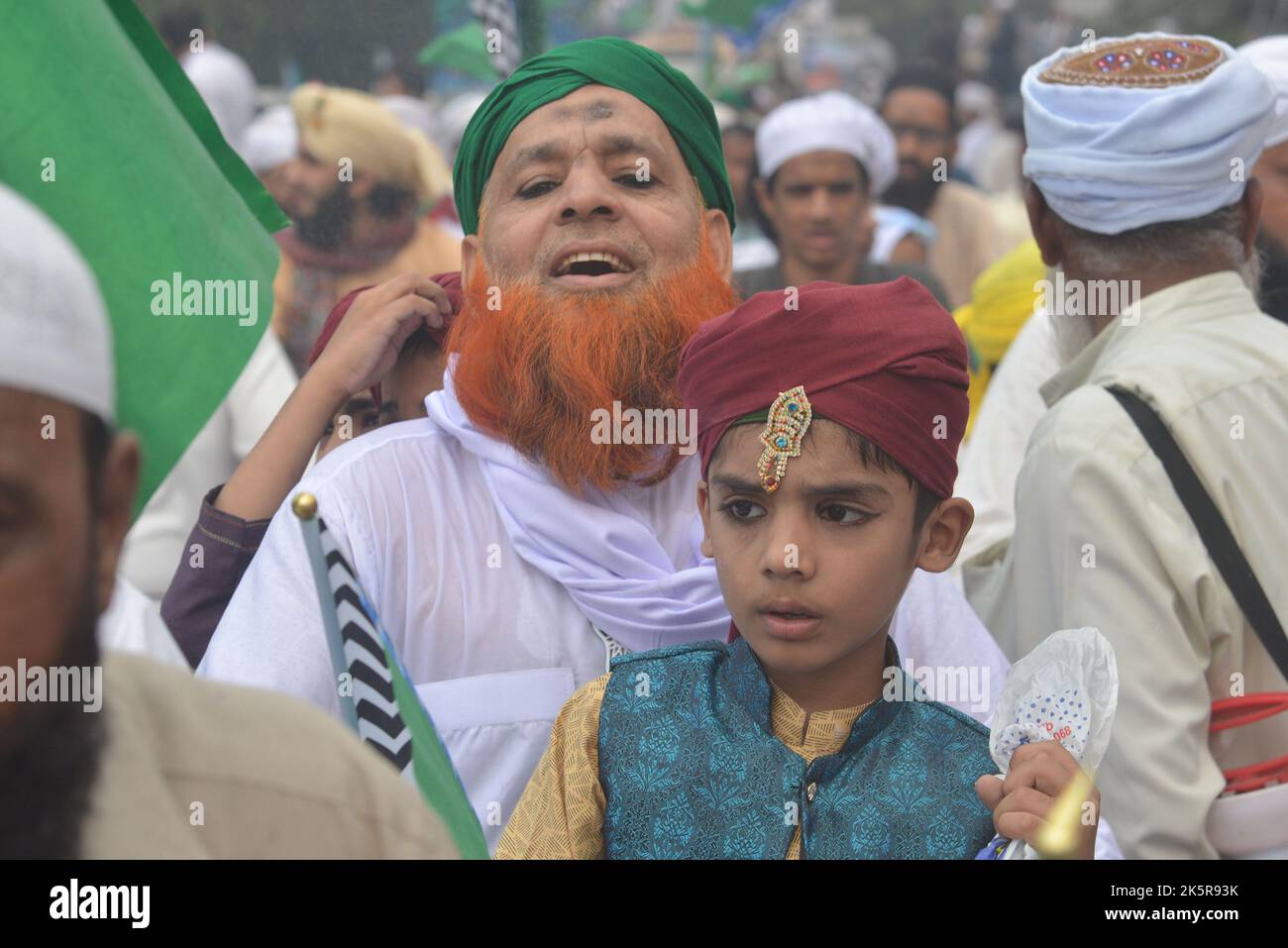 Pakistani faithful devotees participate in a procession of Eid Milad-un ...