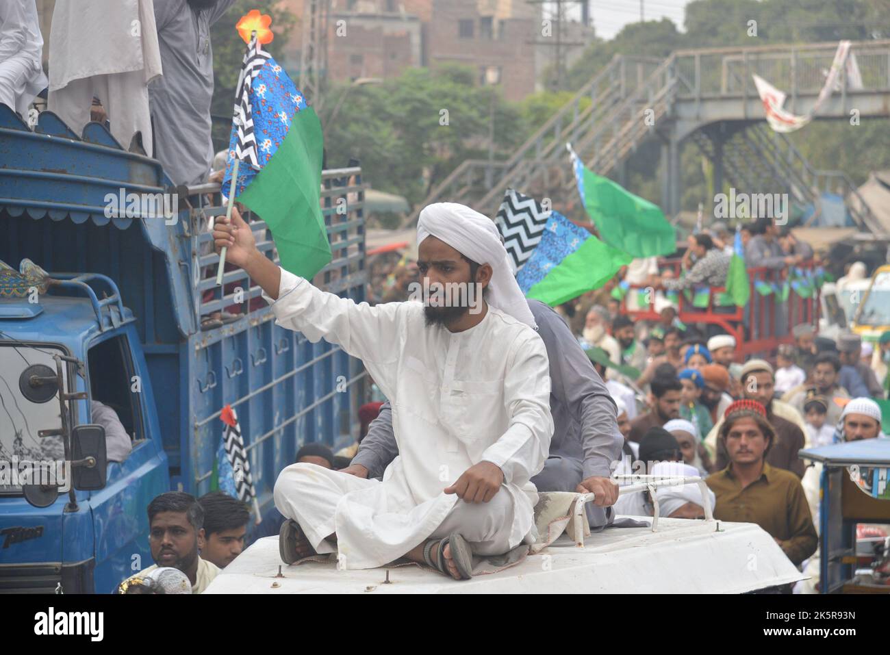 Pakistani faithful devotees participate in a procession of Eid Milad-un ...