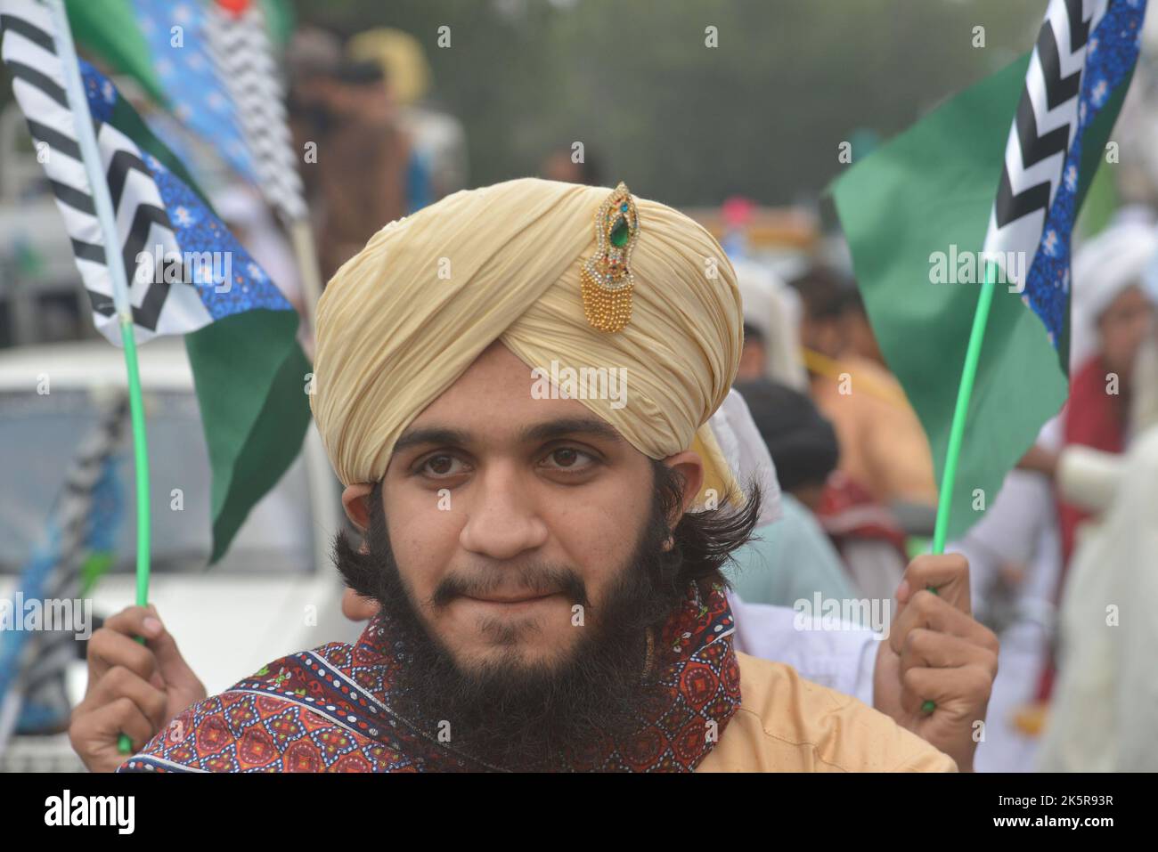 Pakistani faithful devotees participate in a procession of Eid Milad-un ...