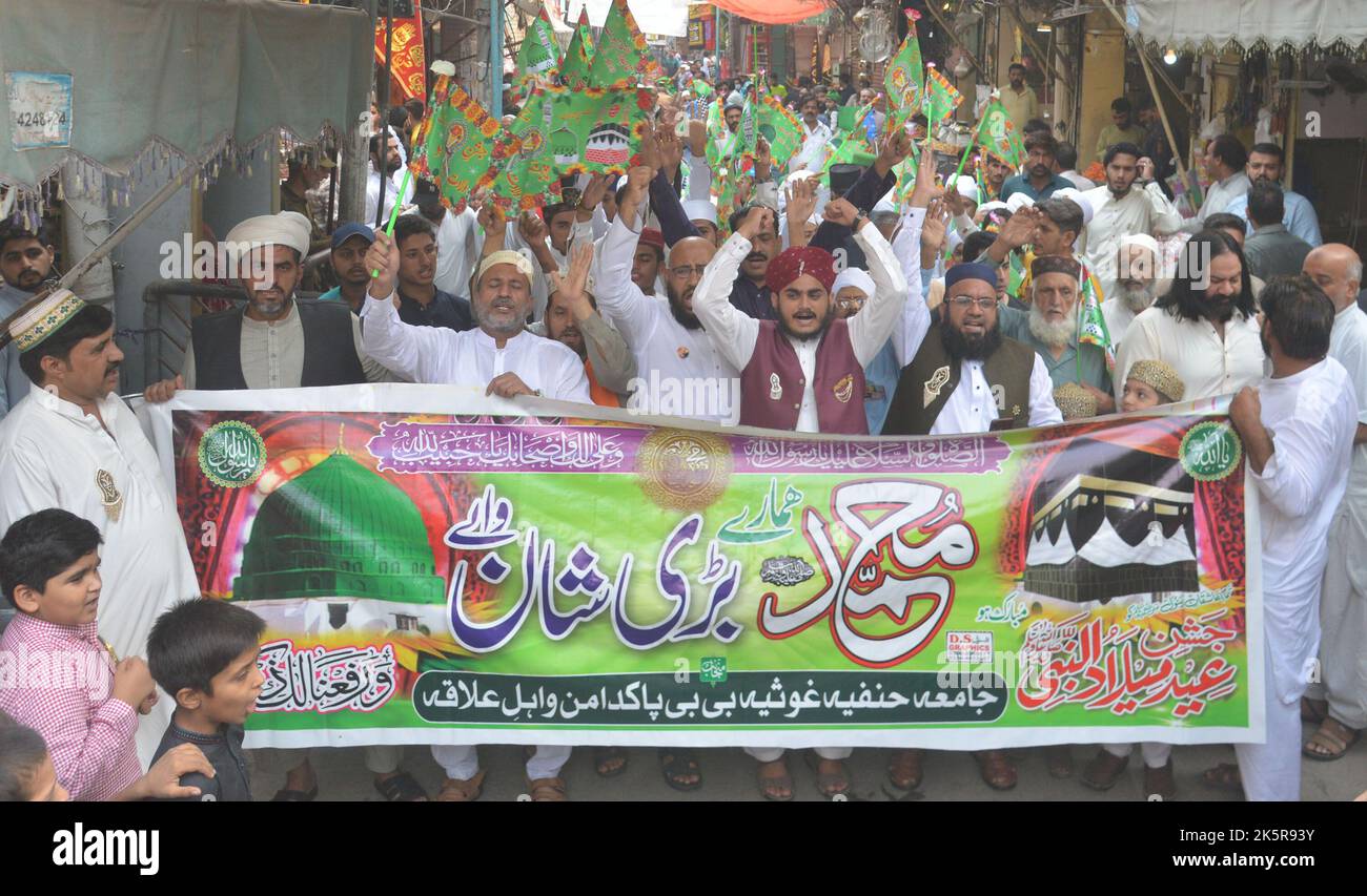Pakistani faithful devotees participate in a procession of Eid Milad-un ...