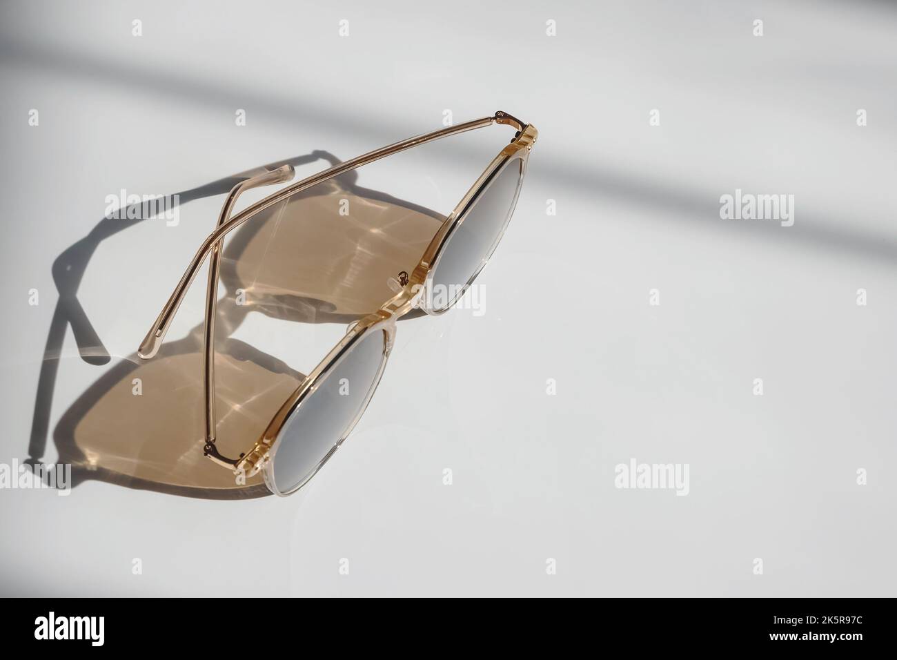 Modern trendy sunglasses in natural light Stock Photo - Alamy