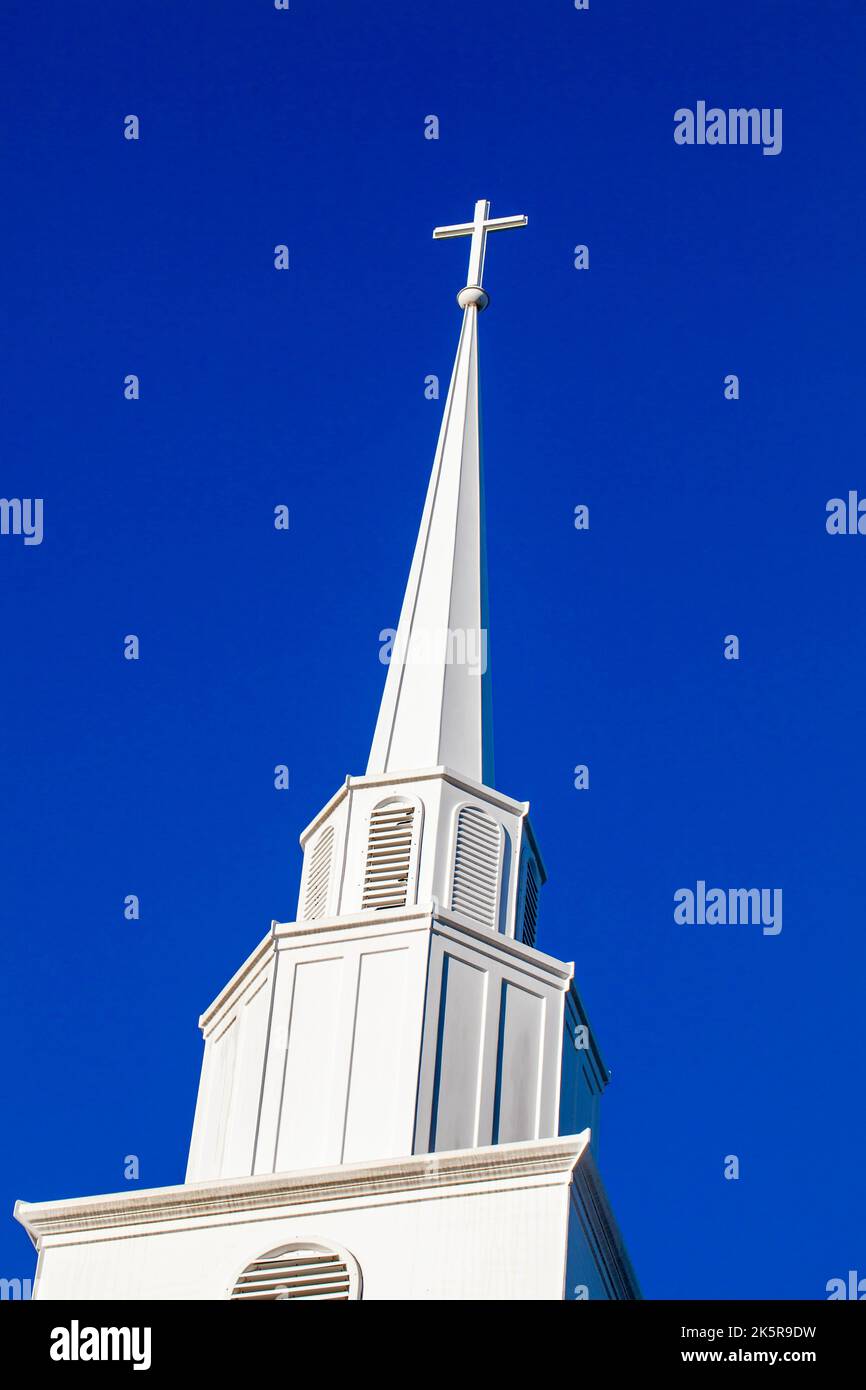 White cross on top of a steeple with copy space, vertical Stock Photo ...