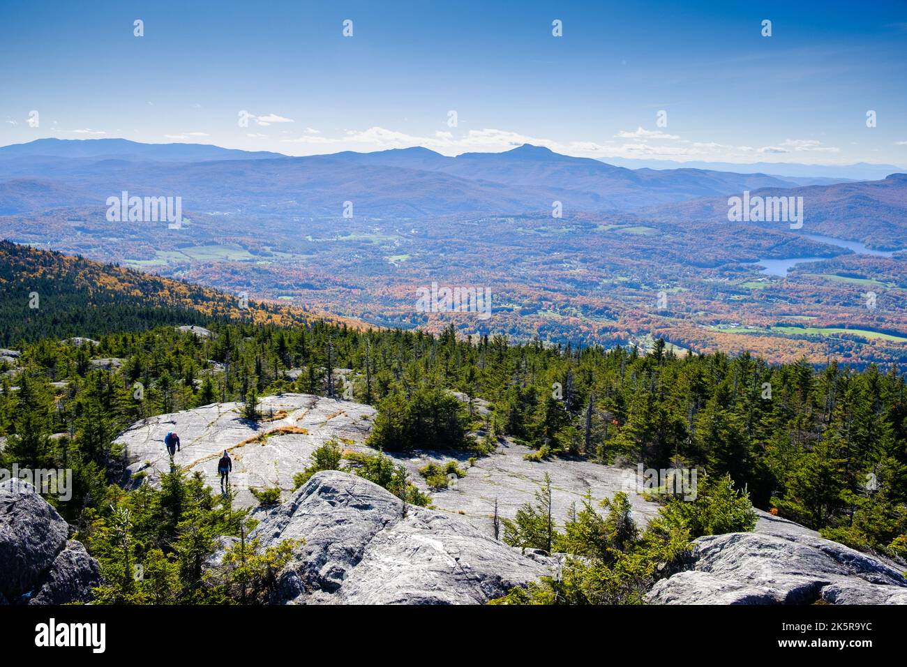 The vibrant colors of autumn foliage surround White Rock Mountain in ...
