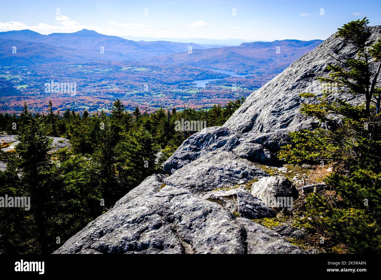 The vibrant colors of autumn foliage surround White Rock Mountain in ...