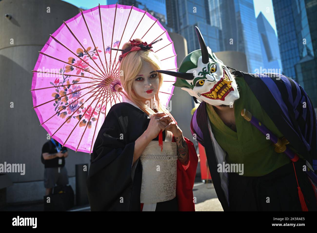 Cosplayers arrive for the final day of the New York Comic Con 2022 at the Jacob Javits Center on ...
