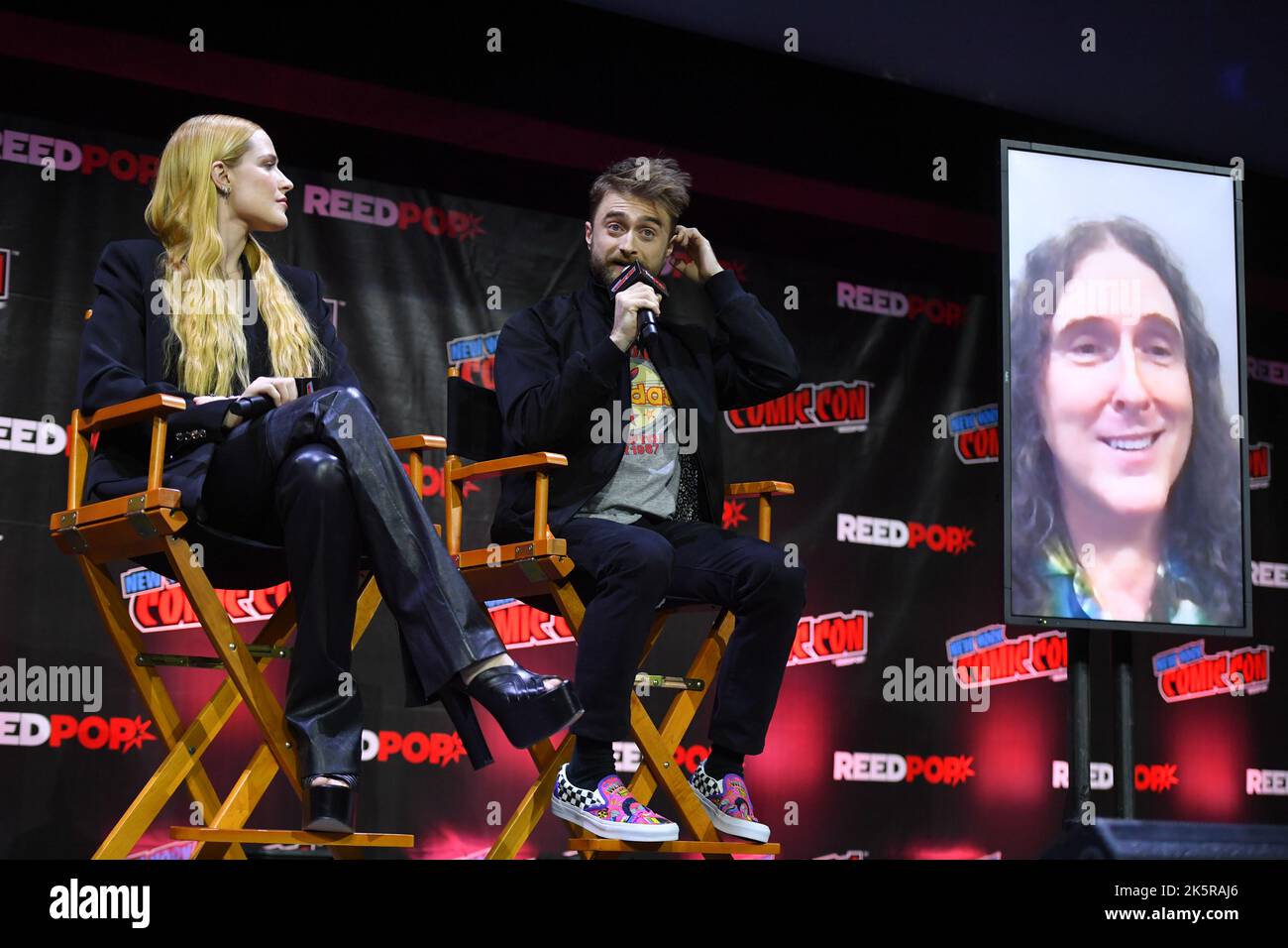 Evan Rachel Wood, Daniel Radcliffe and Weird Al Yankovic speak onstage at Let's Get WEIRD panel ...