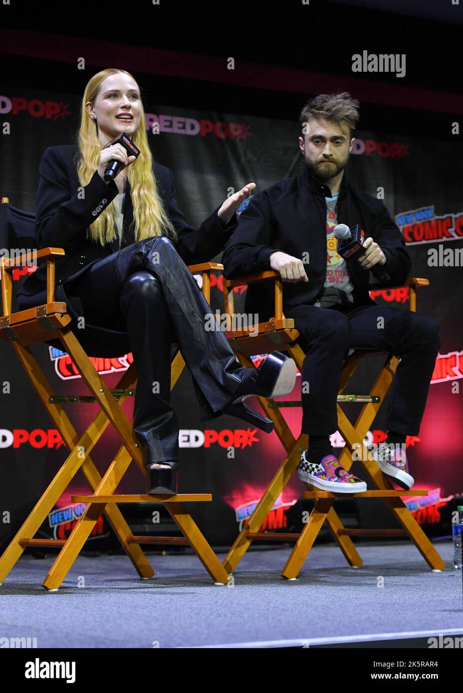 Evan Rachel Wood and Daniel Radcliffe speak onstage at Let's Get WEIRD ...