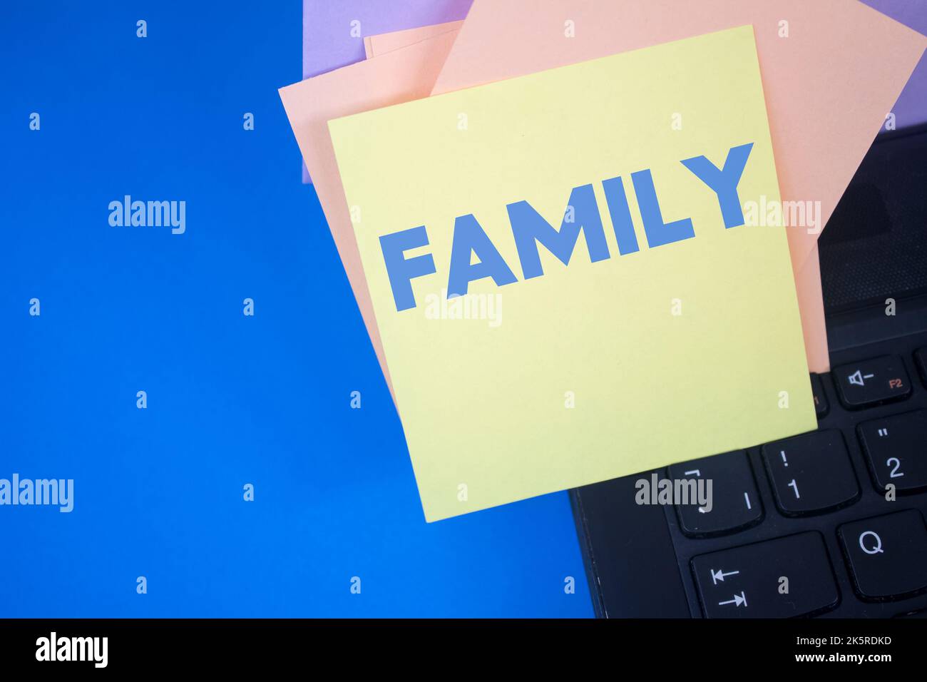 Family. Text on adhesive note paper. Event, celebration reminder ...