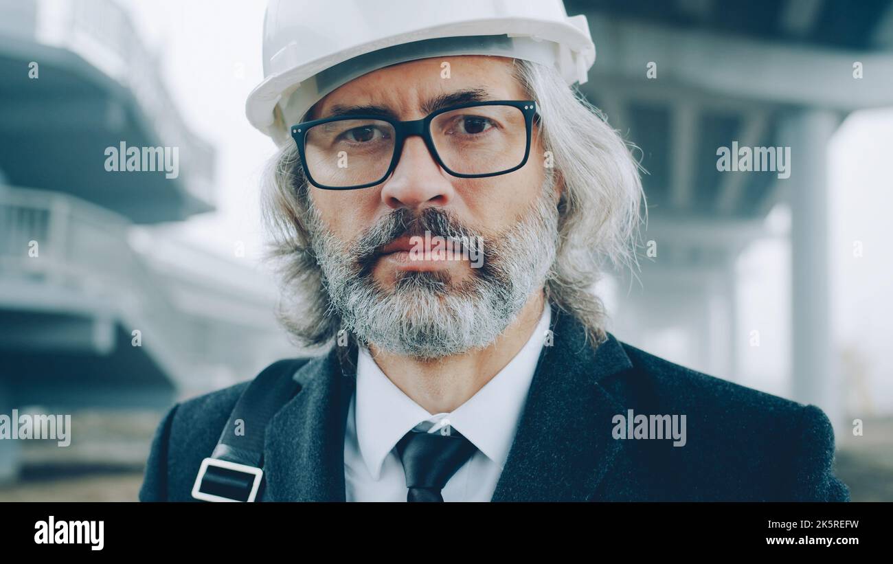 Close-upportrait of building project manager wearing formal clothing ...