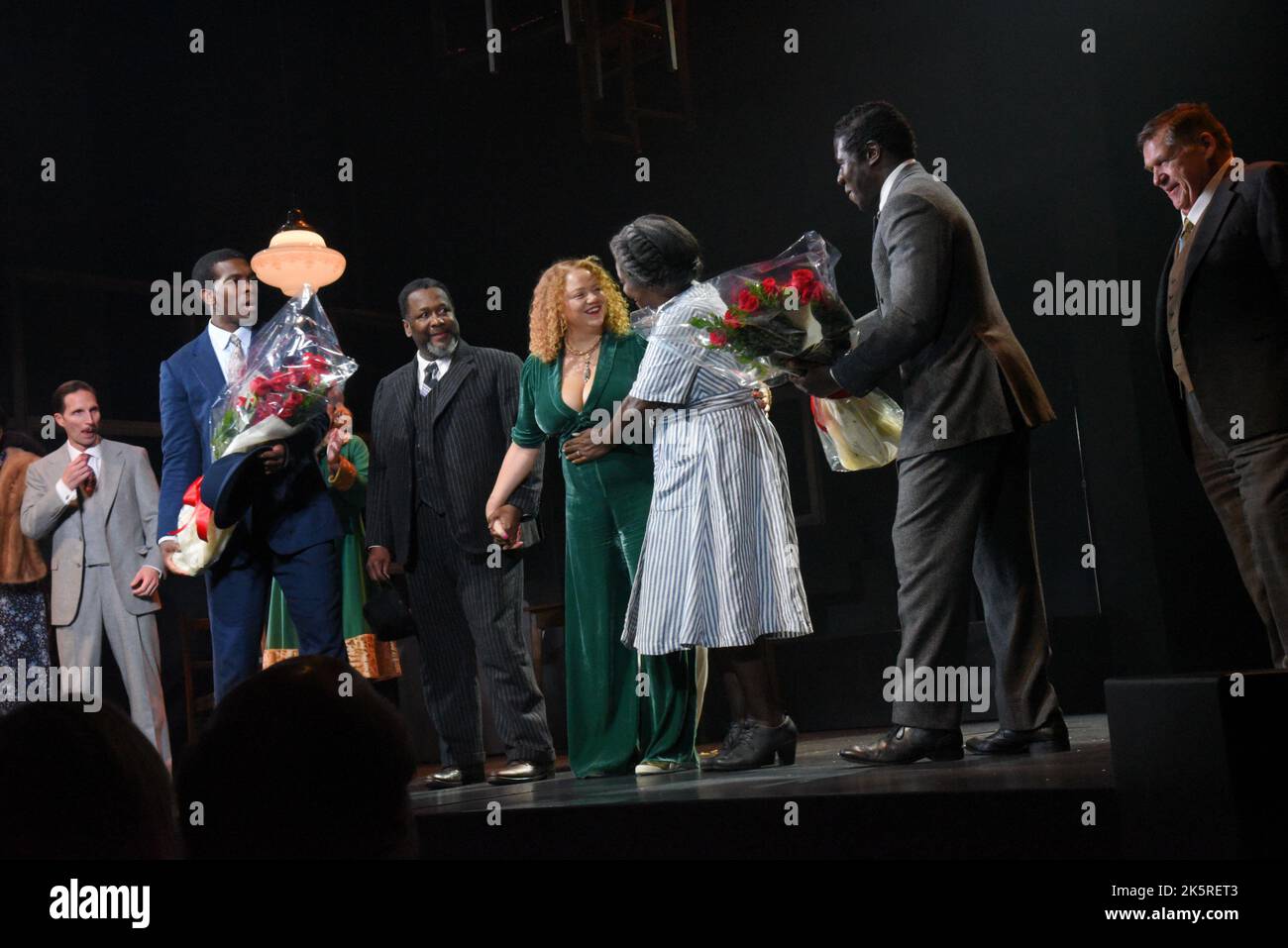 The cast, with director Miranda Cromwell, bow during the curtain call ...