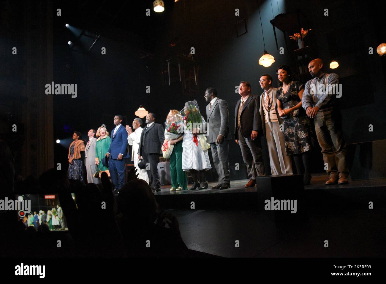 The cast, with director Miranda Cromwell, bow during the curtain call ...