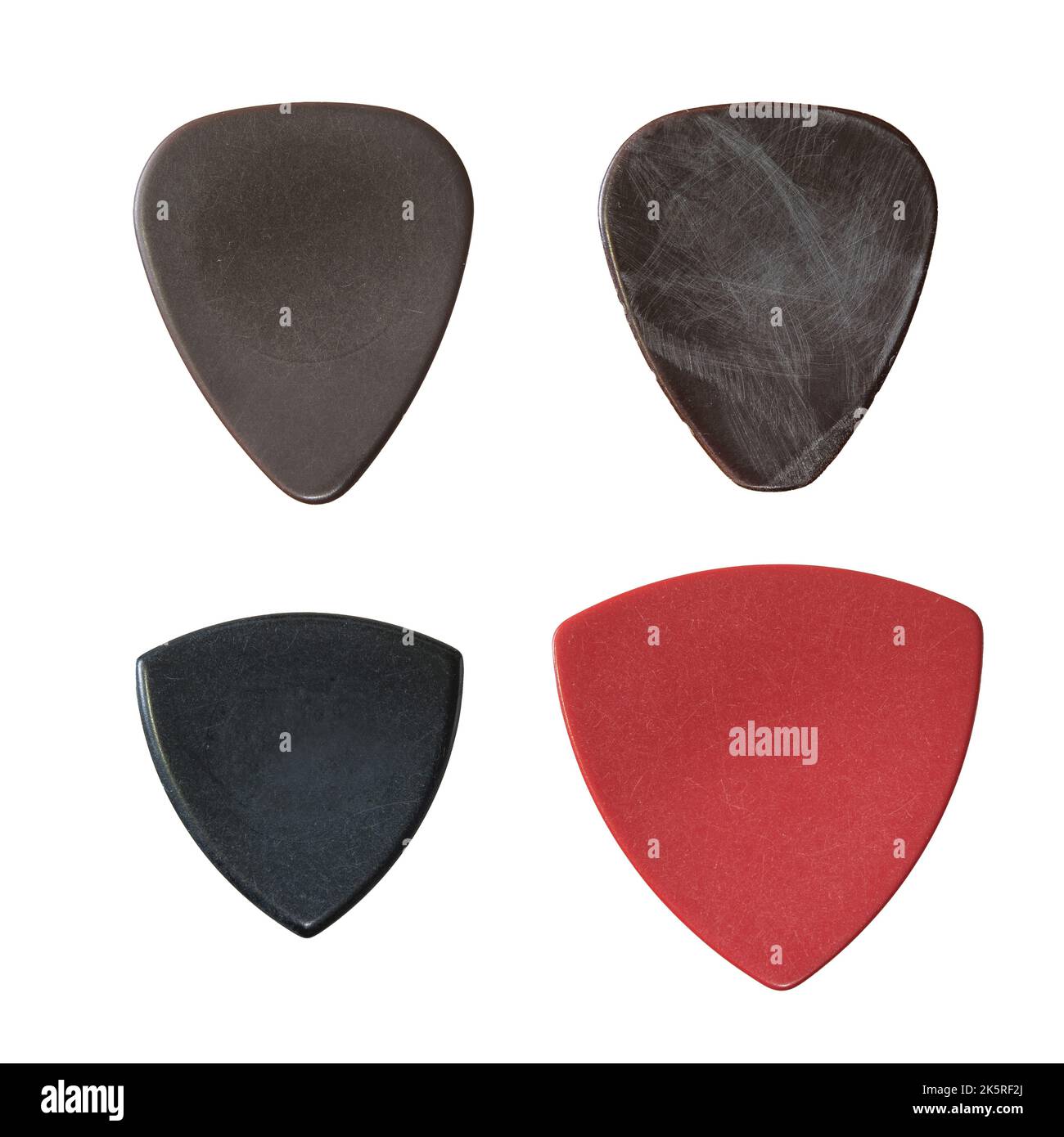 Old and new guitar picks on white background Stock Photo - Alamy