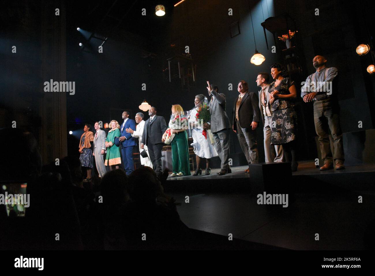 The cast, with director Miranda Cromwell, bow during the curtain call ...